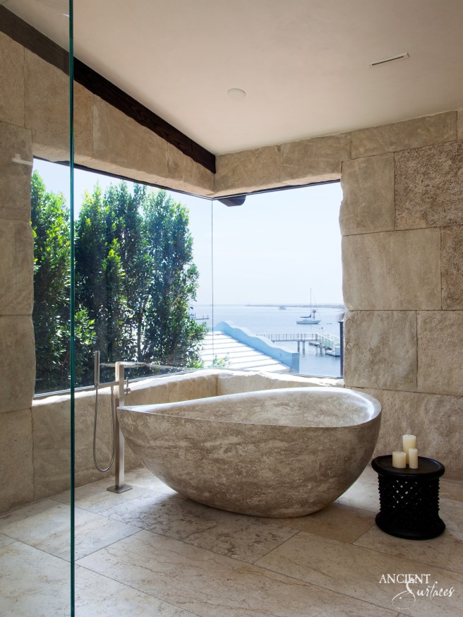 The Luxurious Allure of Ancient Surfaces' Stone Tubs